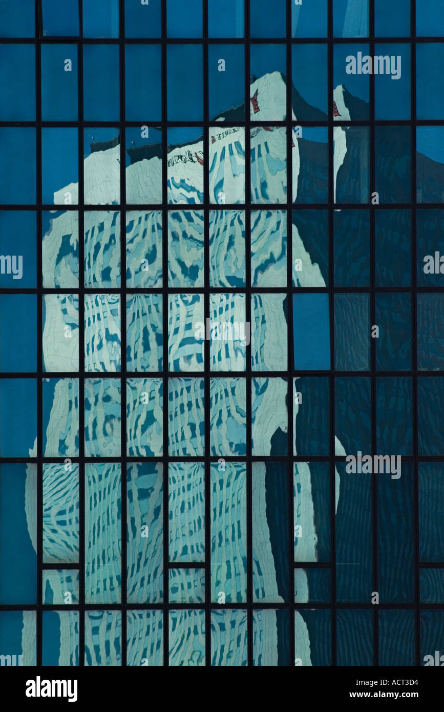 Reflections in glass cladding of a building at La Defense Paris France ...