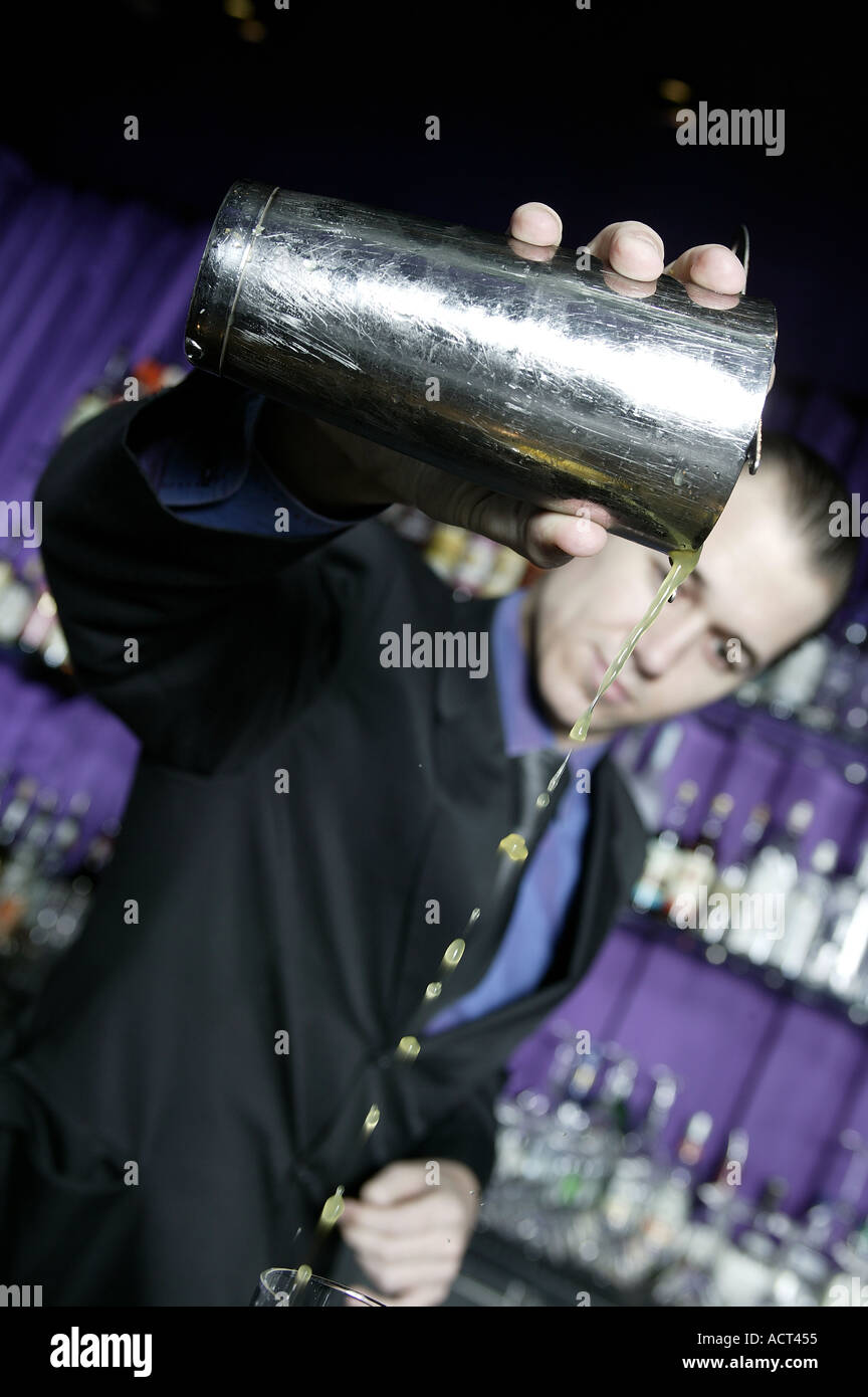 Bar tender mixing drink hi-res stock photography and images - Alamy