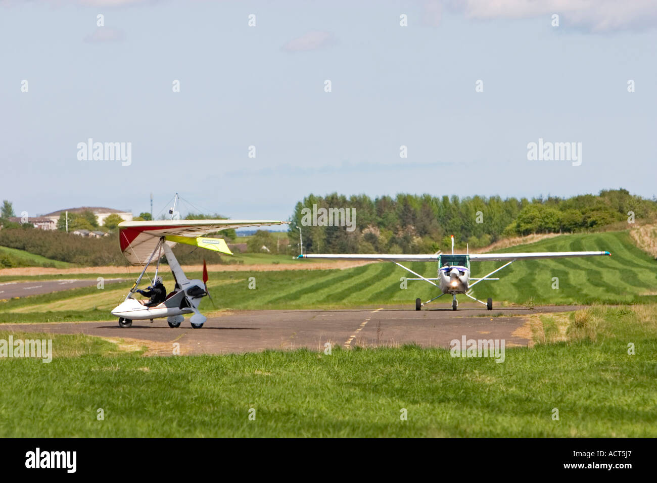 Microlight and light aircraft taxi to take off at Glenrothes local ...