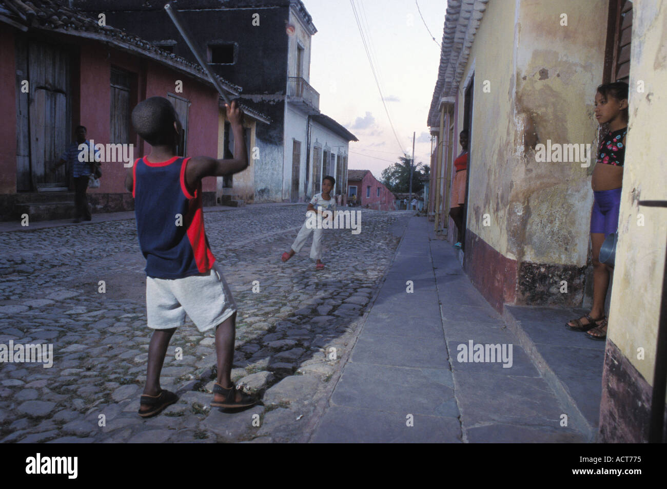 Kids Playing Baseball In The Street