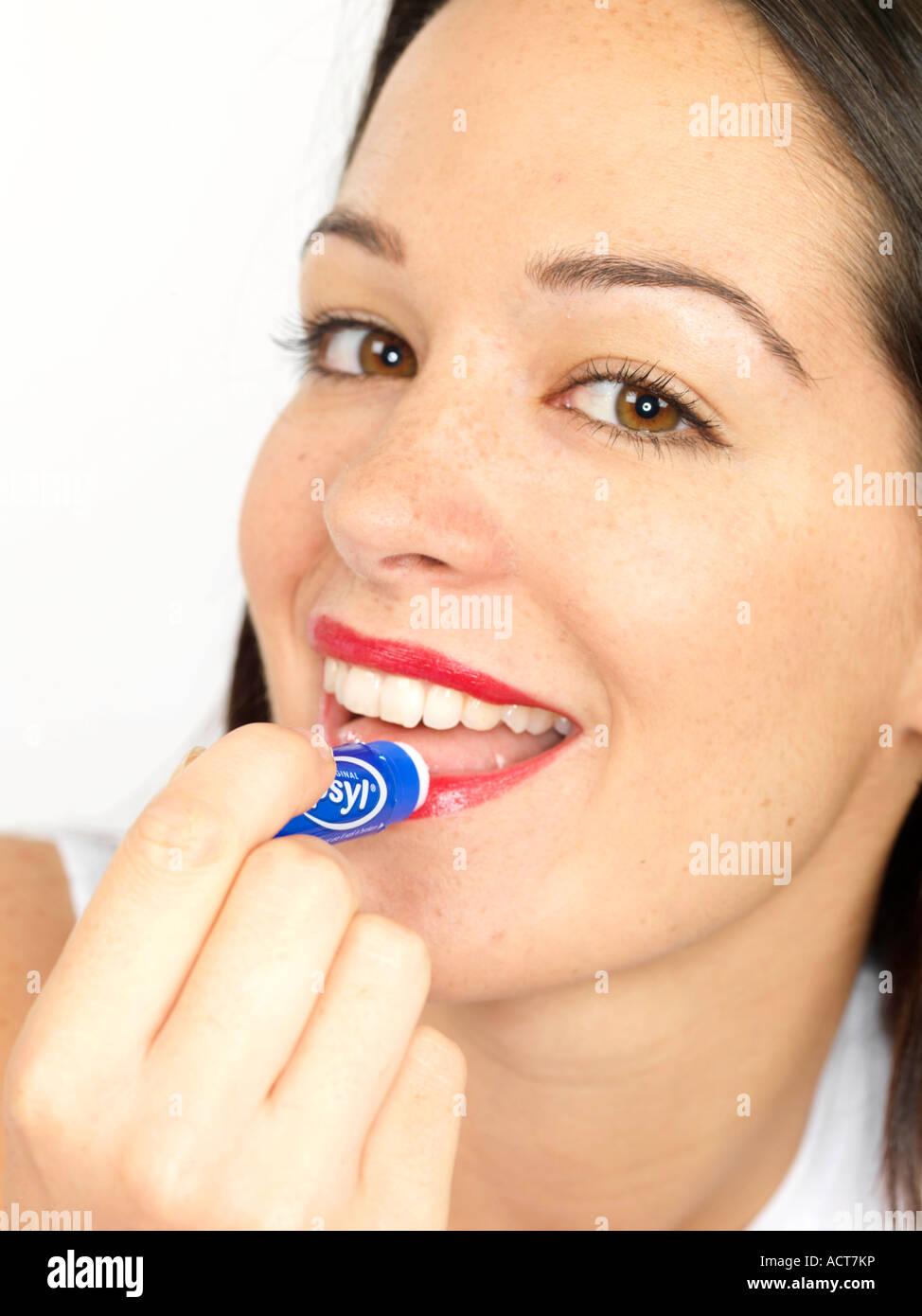 Young Woman Appyling Lip Balm Model Released Stock Photo - Alamy