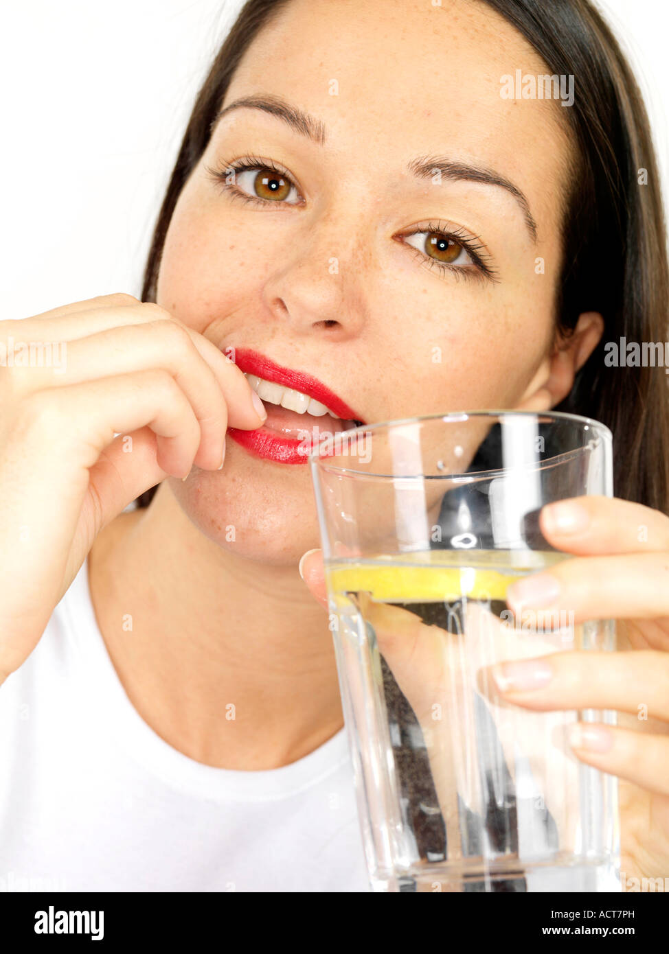Young Woman Taking Pill Model Released Stock Photo - Alamy