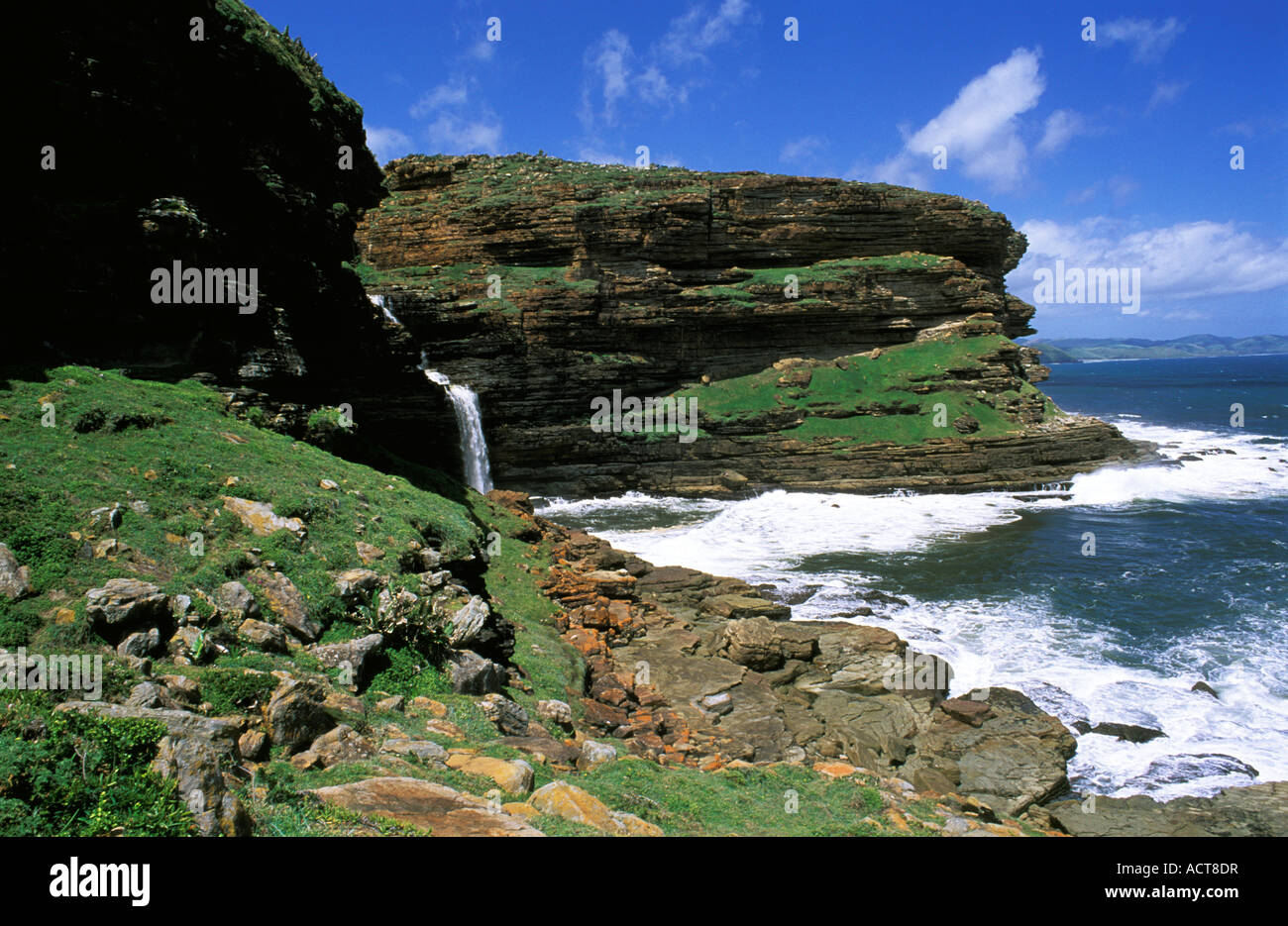 Scenic view of waterfall plunging into sea Waterfall Bluff Transkei ...