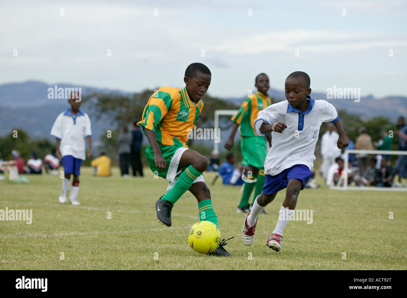 School children eleven year olds playing soccer during a schools Stock ...