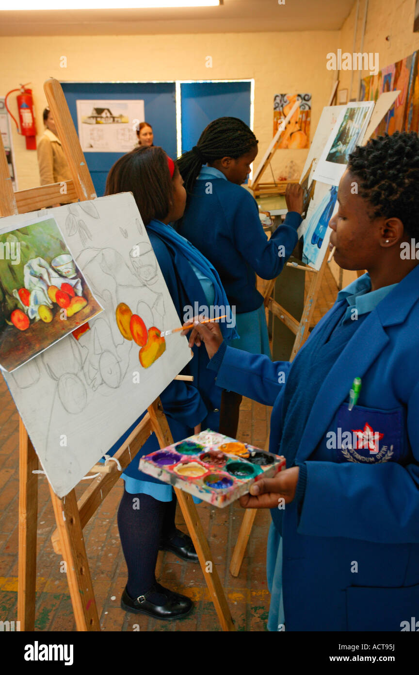 A girl in Lowveld High School painting a still life during an art class ...
