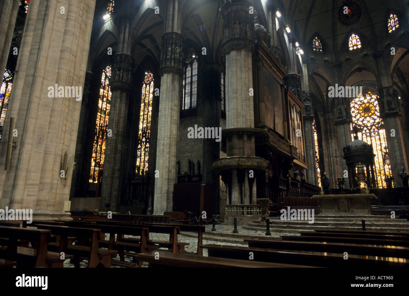 Ornate altar and columnar structure making up the interior of Milan ...