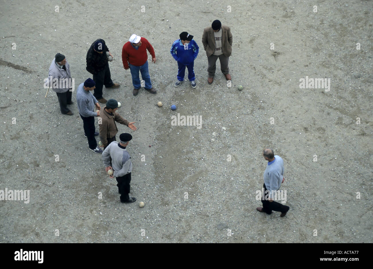Men playing the bocce, a traditional version of the game of boules ...