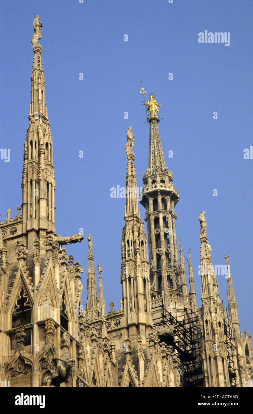 Iconic white pointed Gothic spires of the Milan Cathedral, Milan, Italy ...