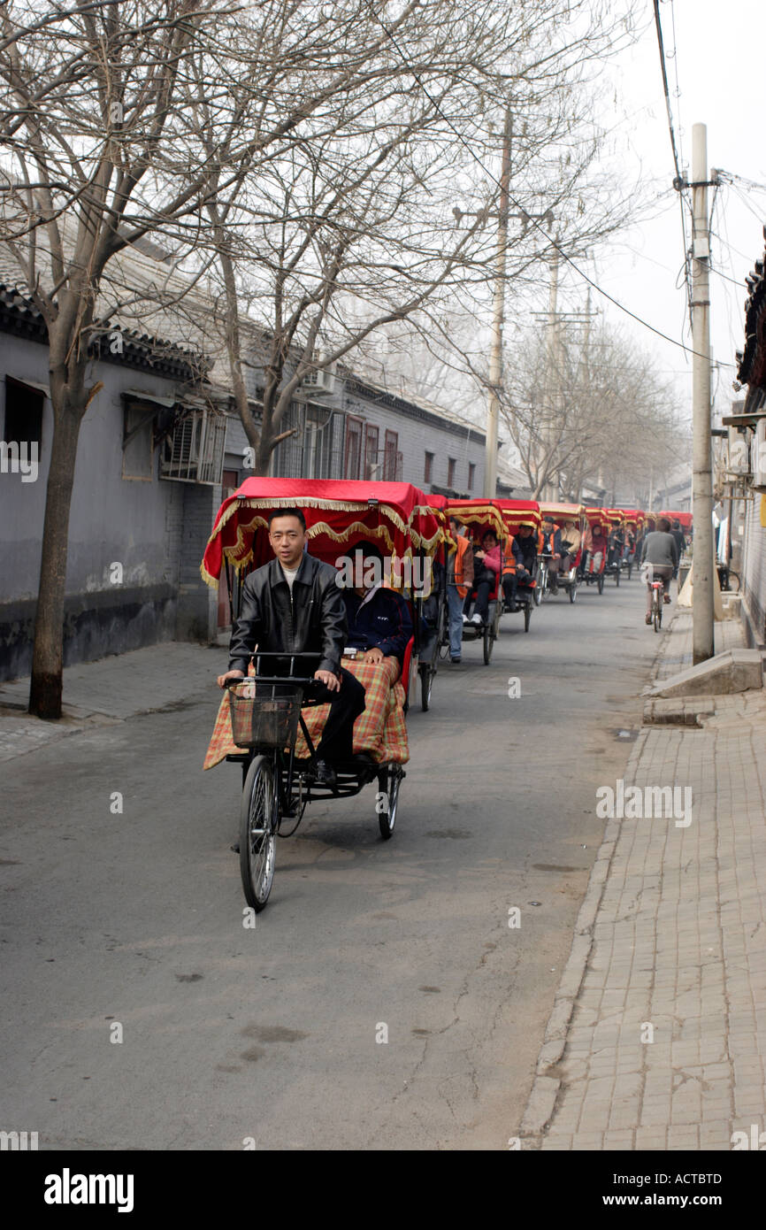 Tour by rickshaw in hutong hi-res stock photography and images - Alamy