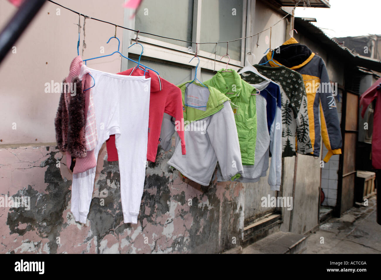 Clothes hanging out to dry Stock Photo - Alamy