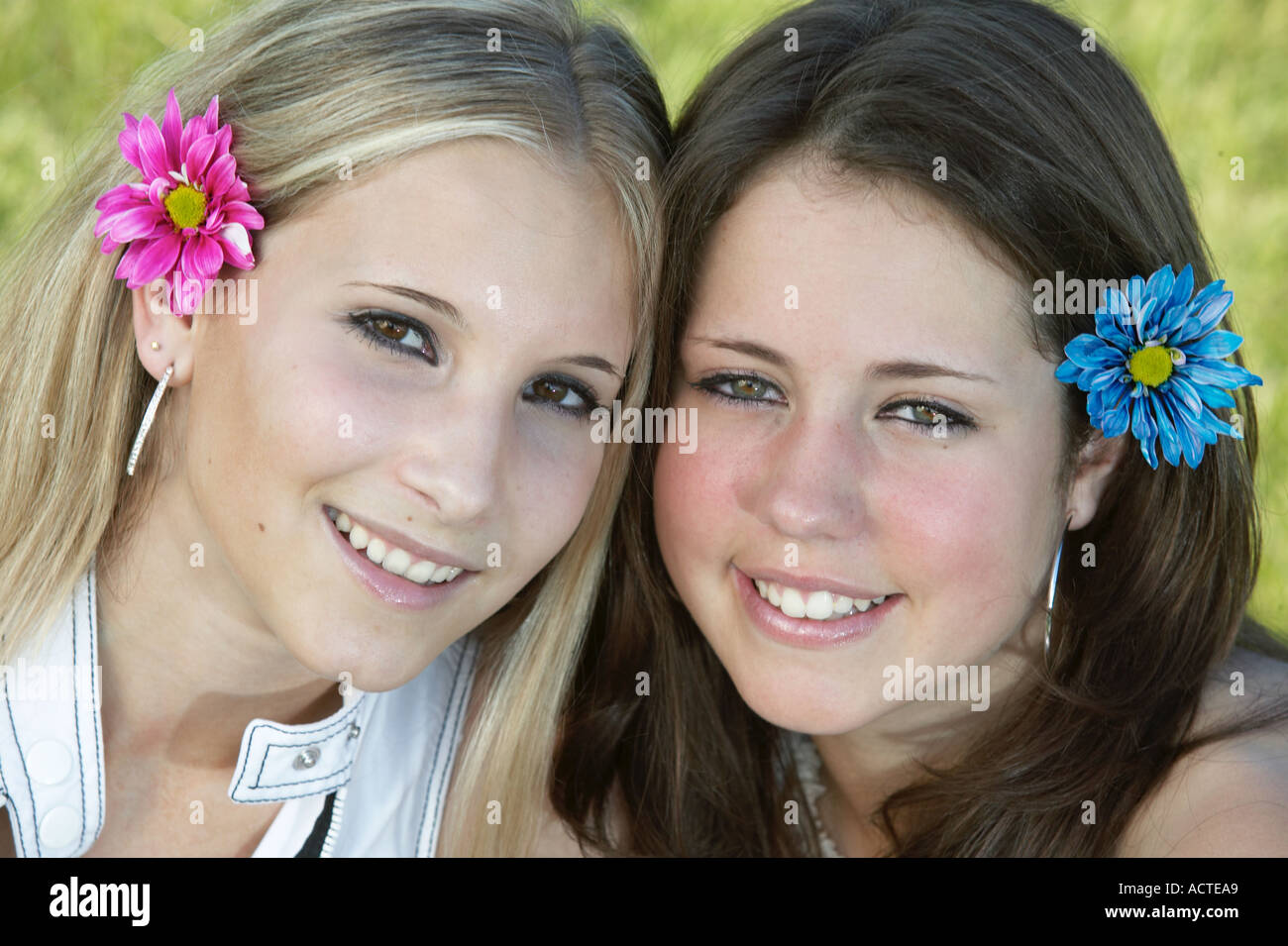 Two teenage girl friends in summer park Stock Photo - Alamy