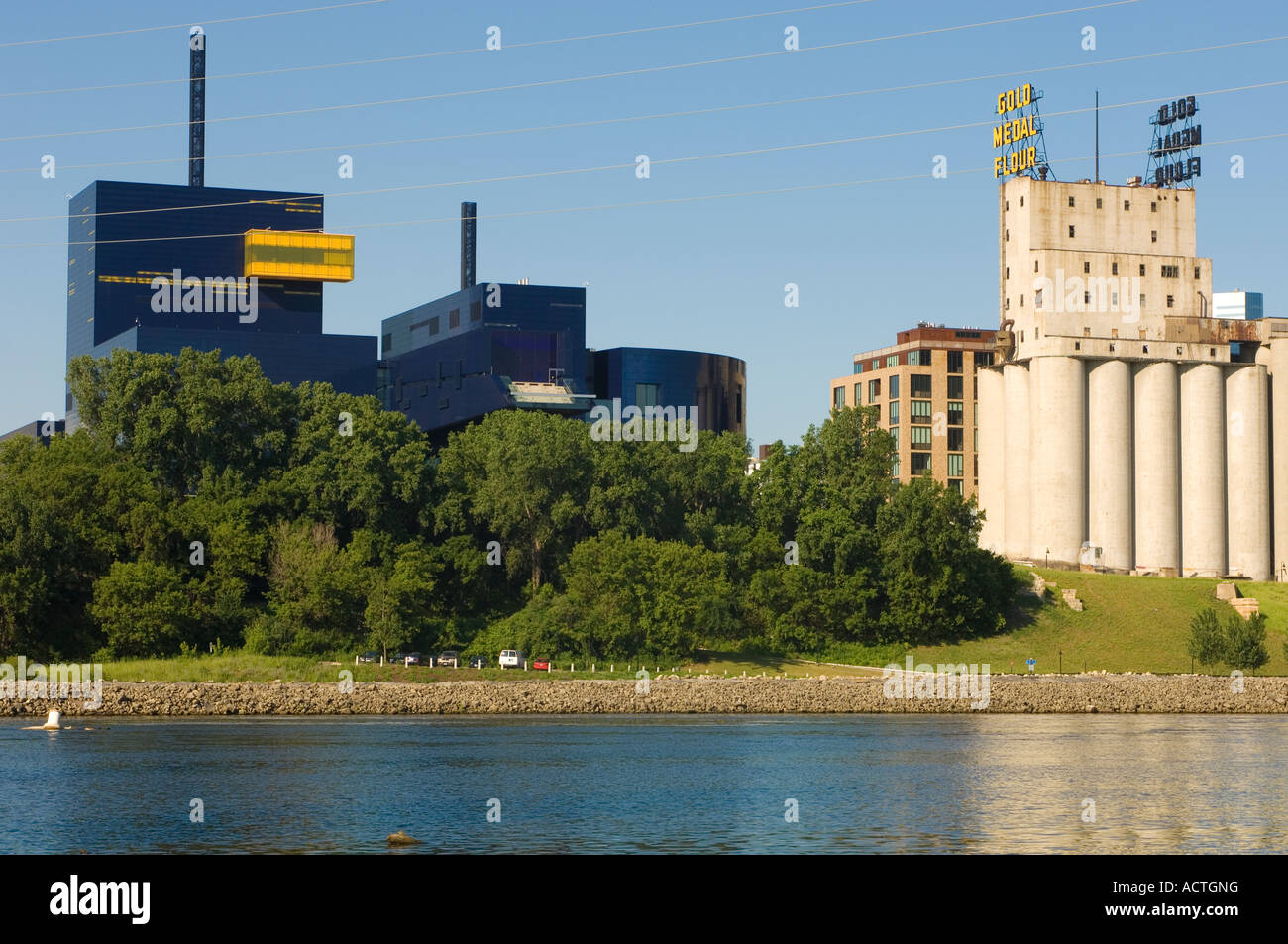 The Guthrie Theater Stands Behind The Mississippi River Minneapolis