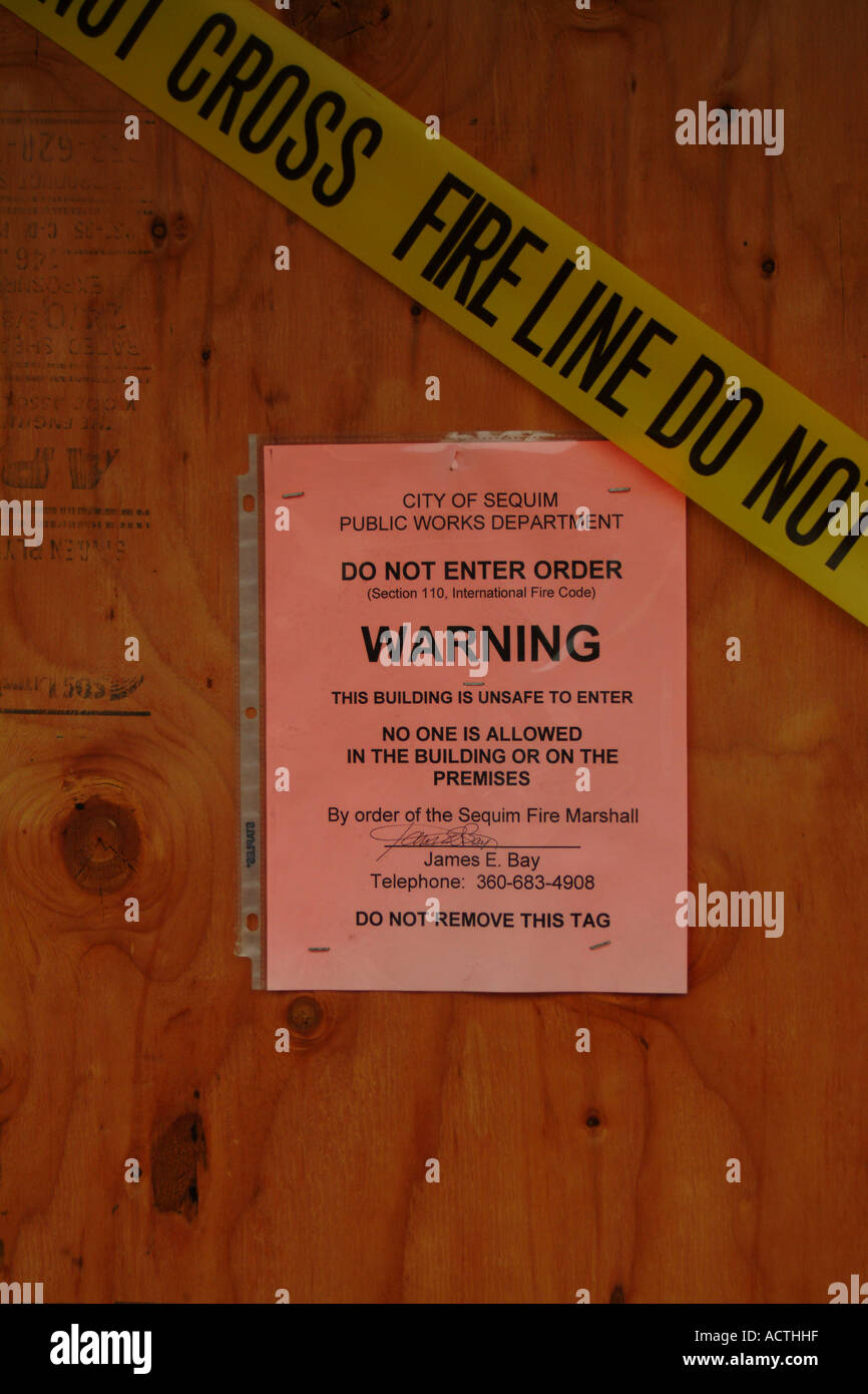 Fire line and warning sign after structure fire Stock Photo - Alamy