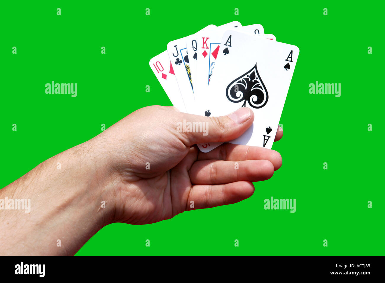 Hand holding playing cards Stock Photo - Alamy