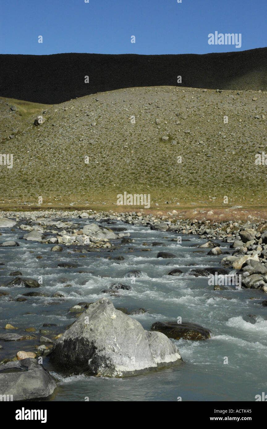 Wild river with hills in light and shade Kharkhiraa Mongolian Altai ...