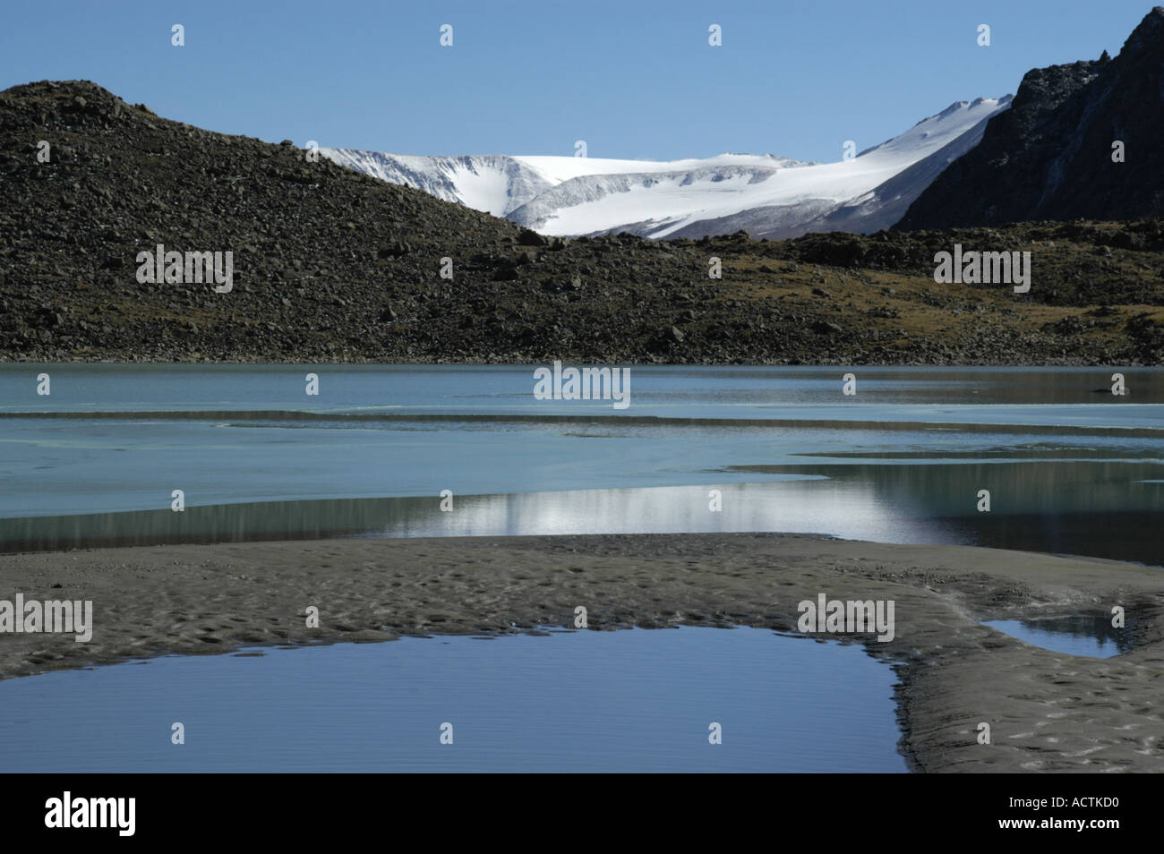 Blue mountain lakes with snow covered mountains Kharkhiraa Mongolian Altai near Ulaangom Uvs ...