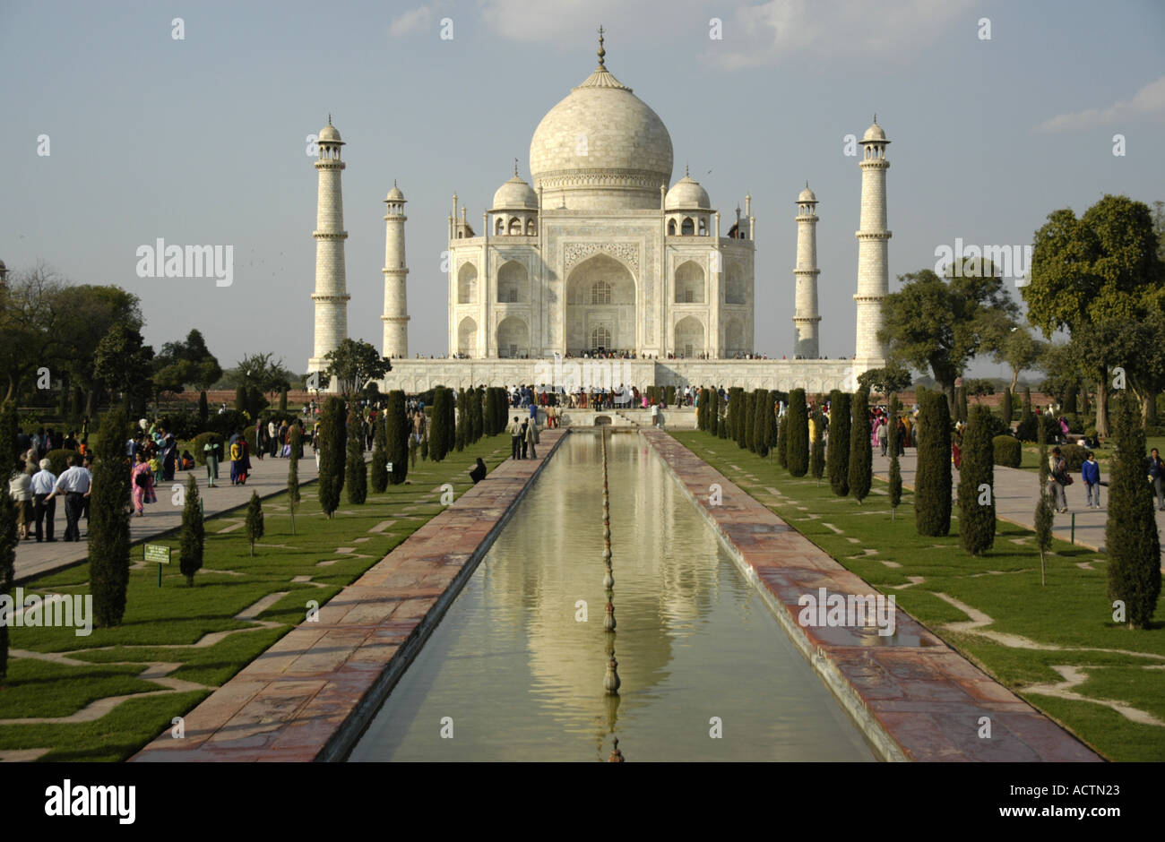 Classical view of the Taj Mahal with its reflection in the water Agra ...