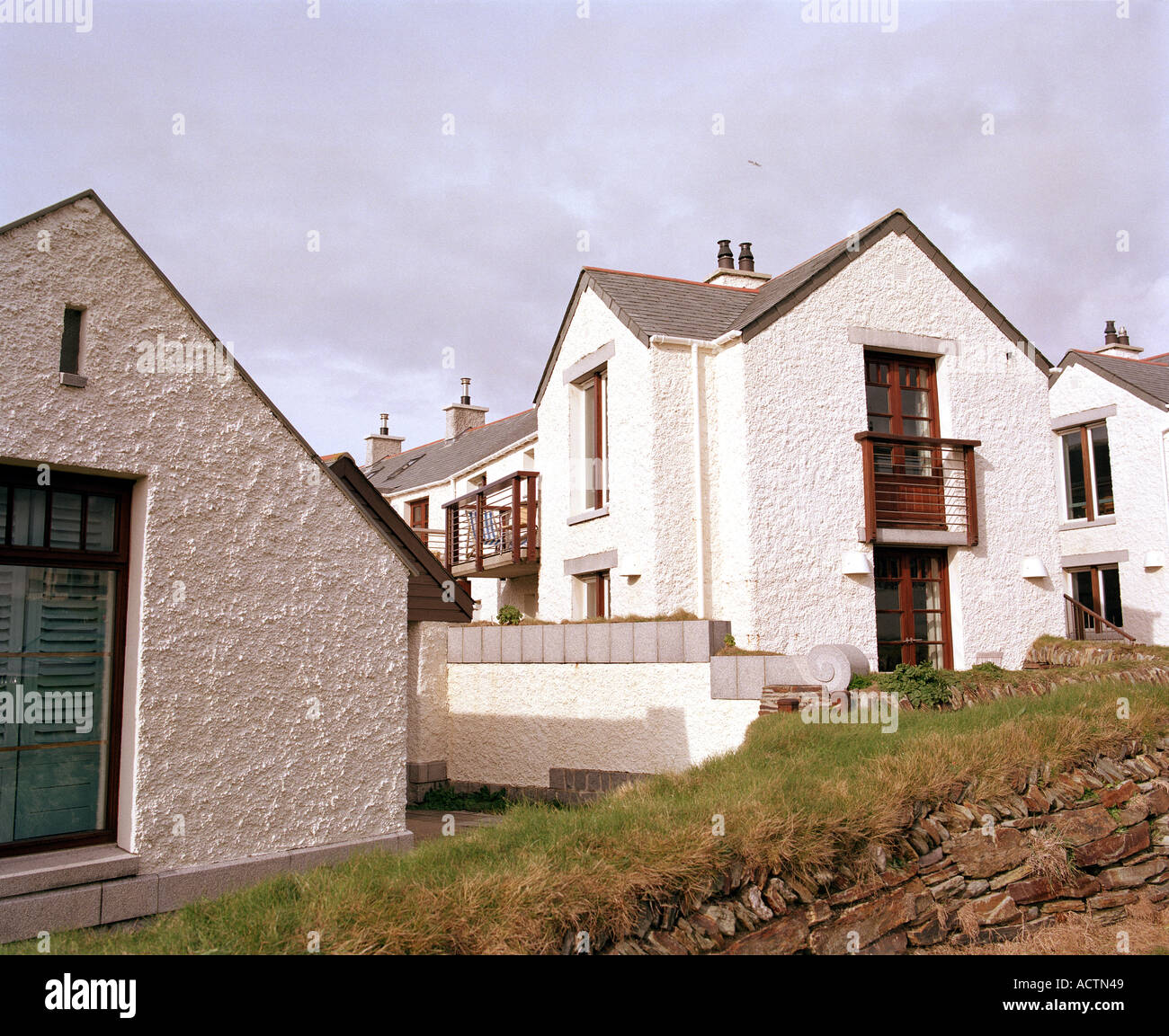 Traditional-style Cornish cottage complex along the Cornish coastal ...