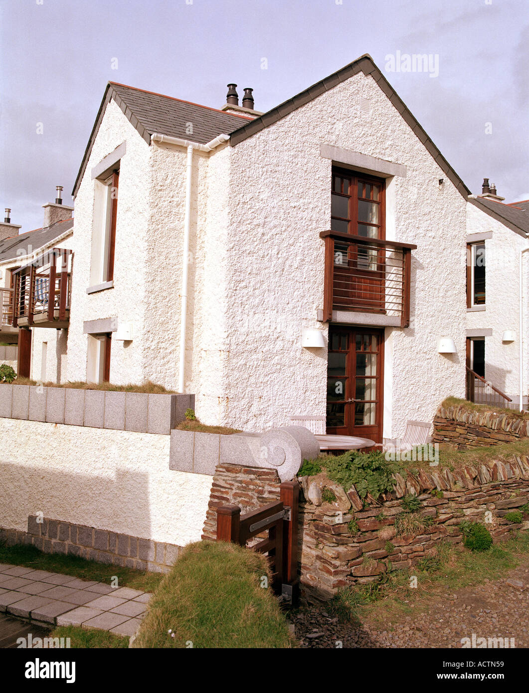 Traditional-style Cornish cottages; coastal path, Newquay, Cornwall ...