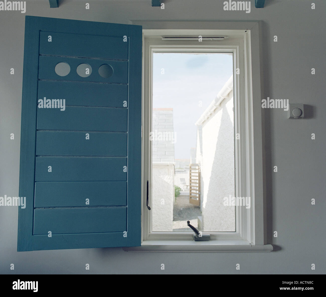 Window and shutter of a traditional-style Cornish cottage, Cornwall ...