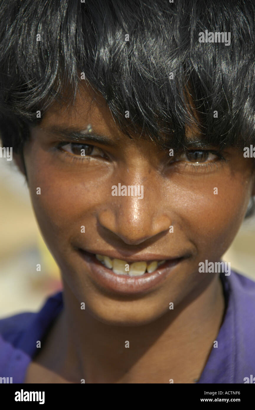 Portrait Indian boy mildly smiling Thar desert near Jaisalmer Rajasthan ...