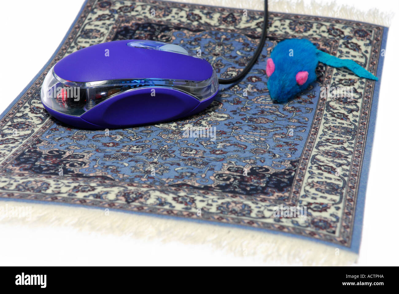 Computer mouse and toy mice on a flying oriental rug Stock Photo - Alamy