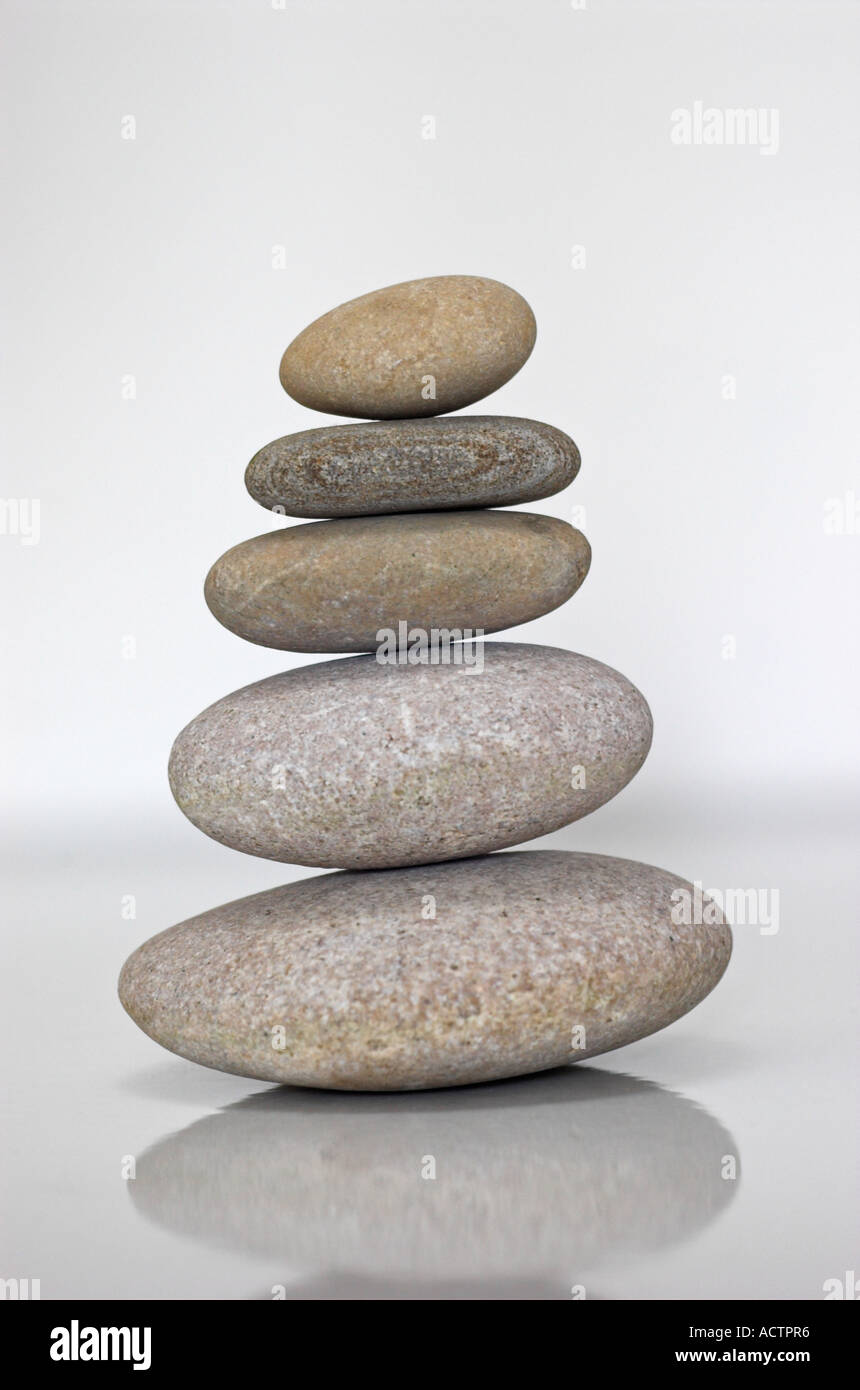 Group of various sized pebbles balanced on top of one another Stock ...