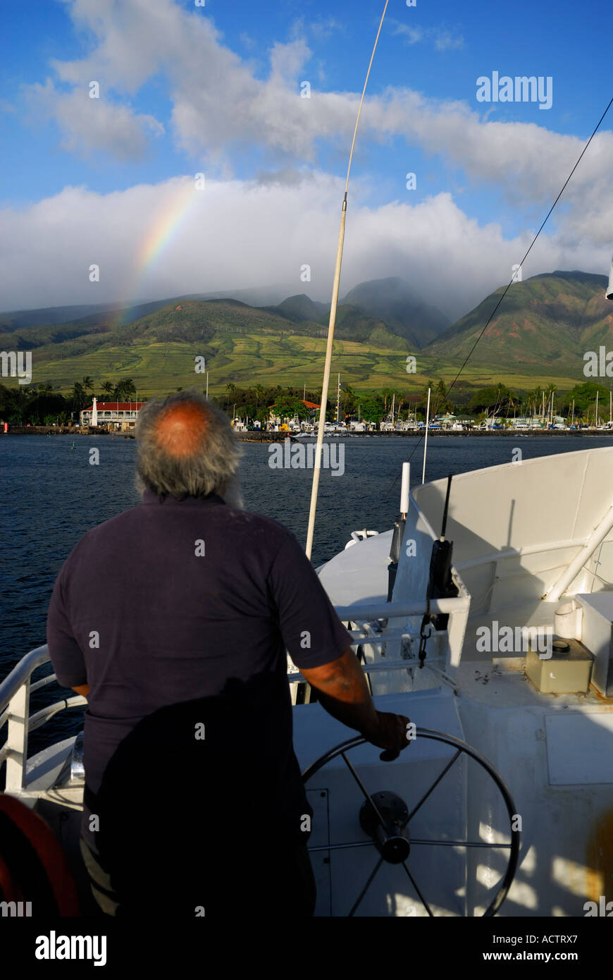 Captain steering the Molokai princess into the Lahaina Harbour Maui ...