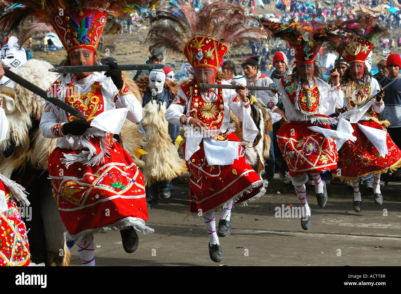 Group of people in traditional dresses dancing during the festival "The ...
