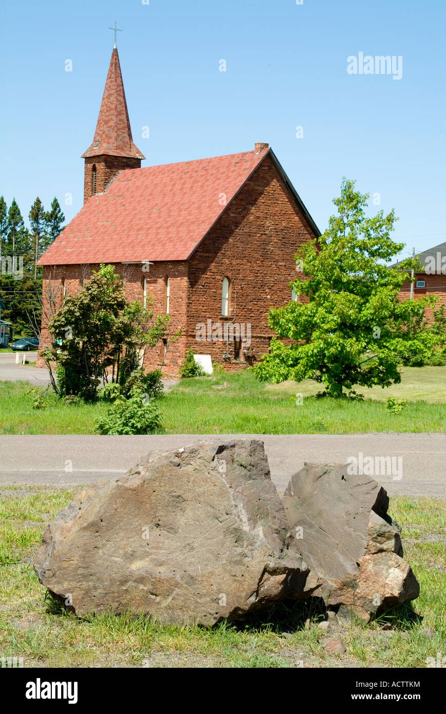 A BEAUTIFUL OLD BRICK CHURCH REAR VIEW WITH TWIN BOULDERS IN THE FORE ...