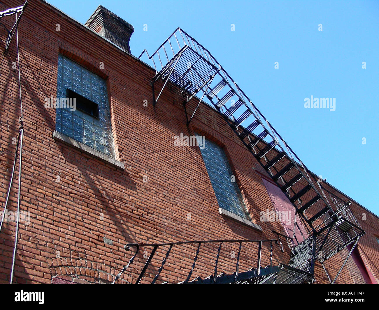 Fire escape on old building Stock Photo - Alamy