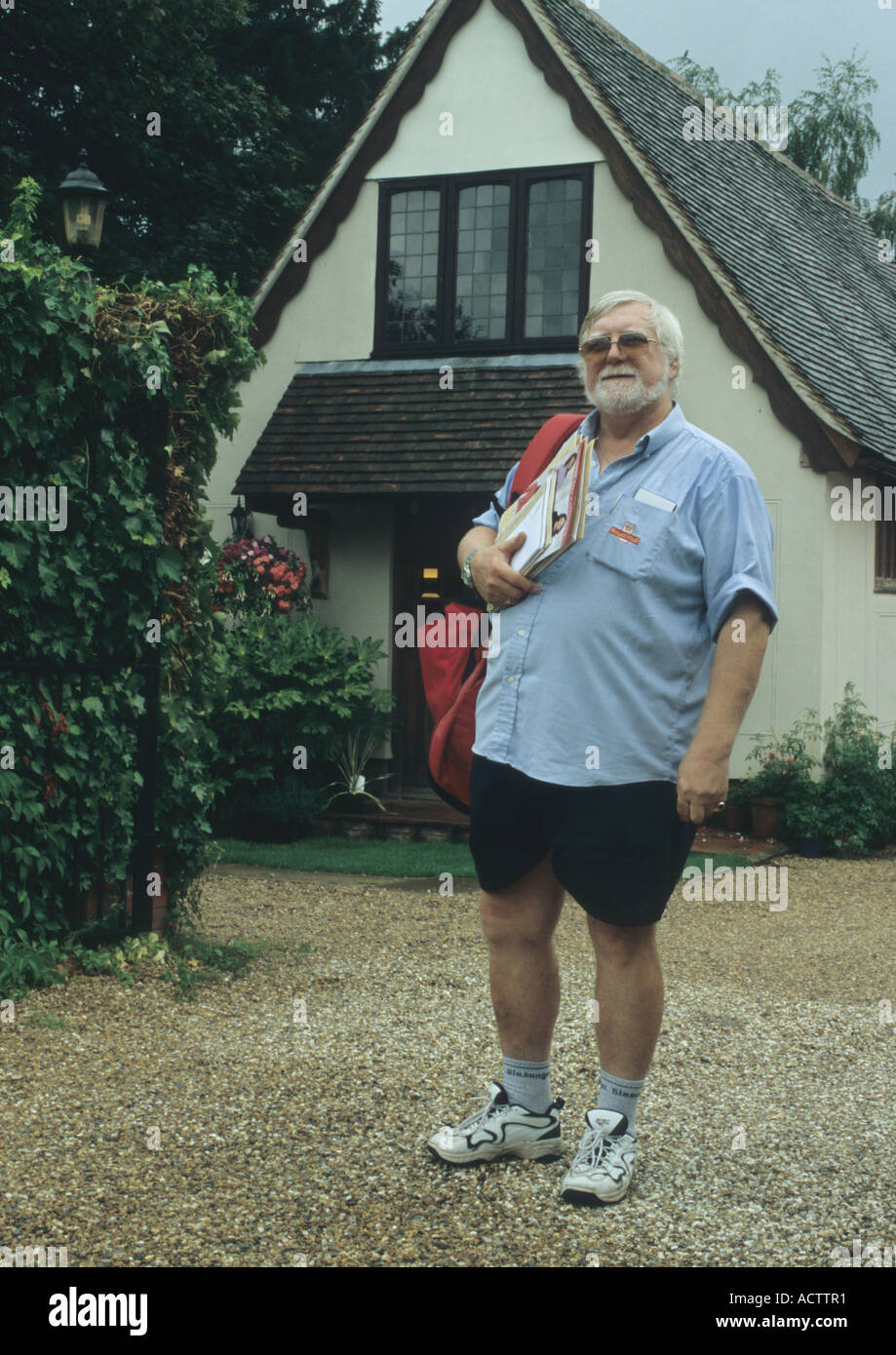 Royal mail postman village hi-res stock photography and images - Alamy
