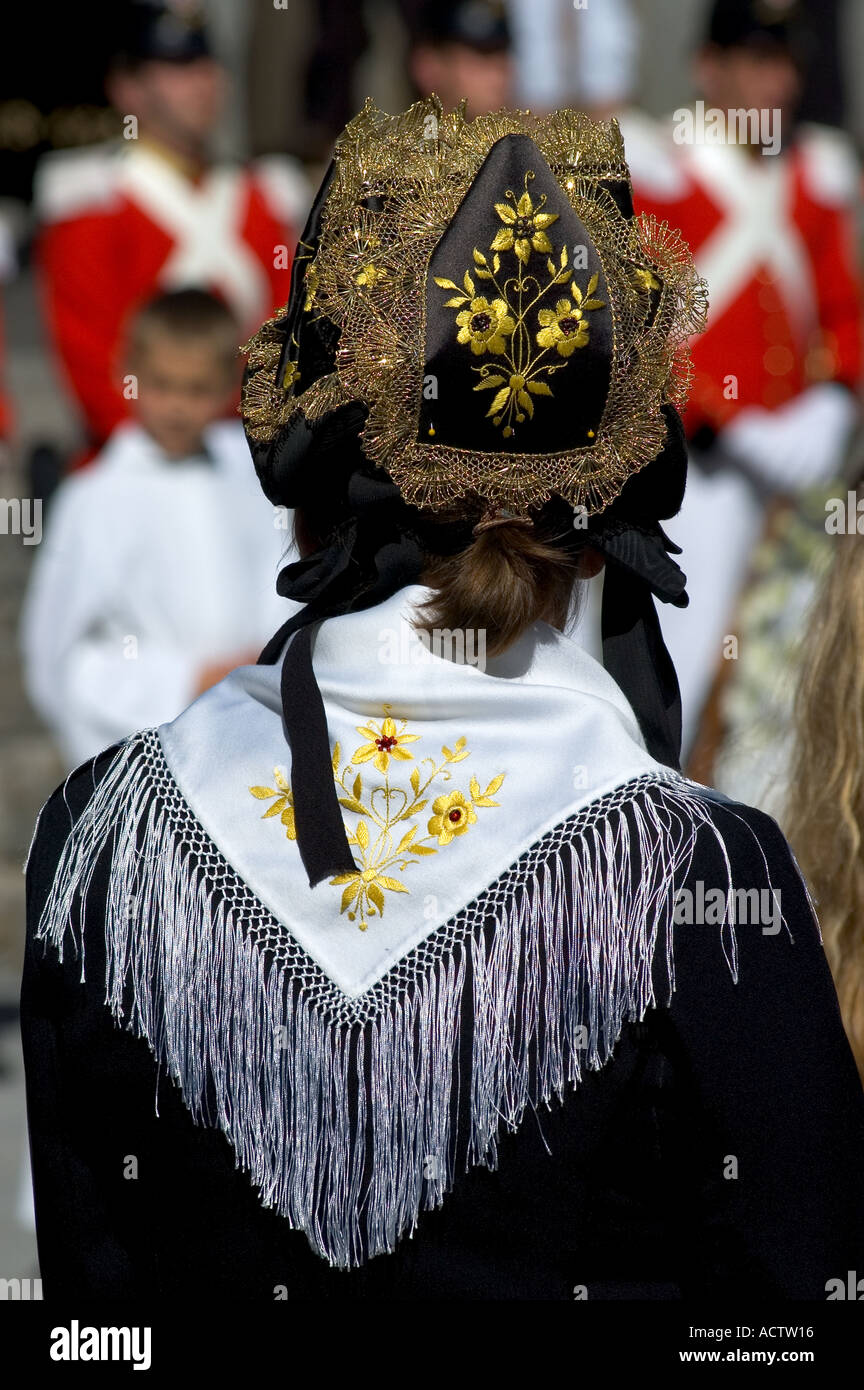 Traditional costume of the Valais golden embroidered female cap Wiler ...