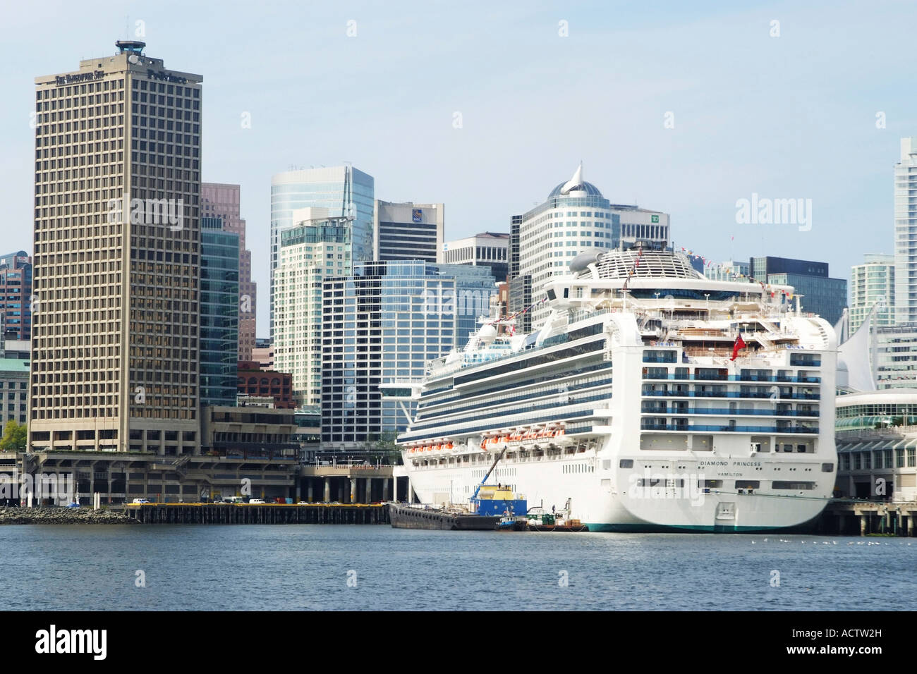 HORIZONTAL VIEW OF CANADA PLACE VANCOUVER PIERS WITH HIGH RISING ...
