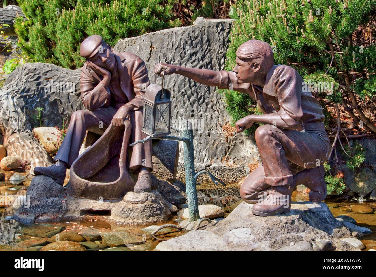 WALL MURAL OF TWO EARLY 20TH CENTURY POSTMEN WORKING ON THEIR EQUIPMENT ...