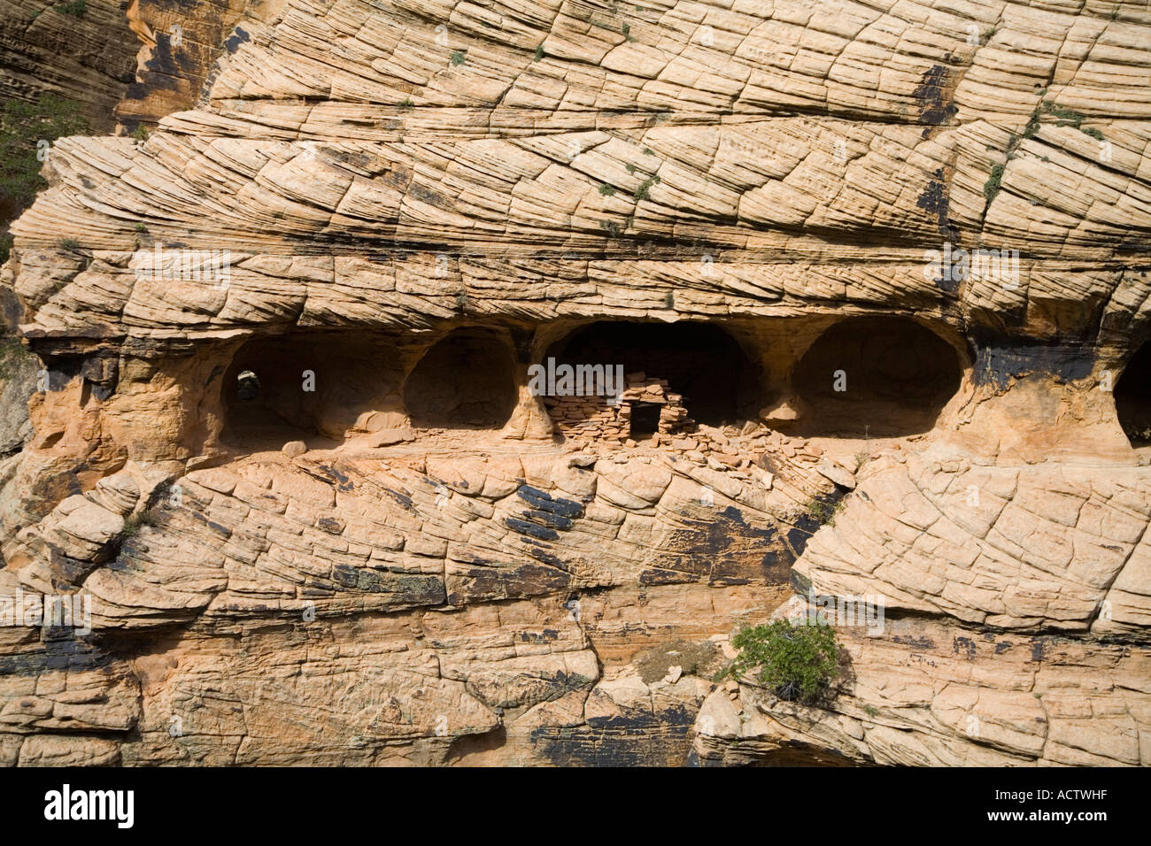 Closeup aerial view of Sinagua Indian caves in rock formations Sedona ...