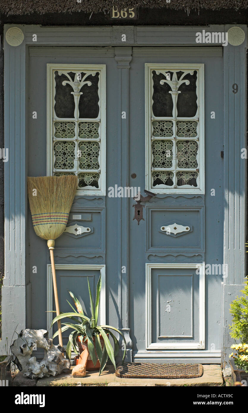 Colored entrance door at a typical house at Wustrow Fischland Germany ...