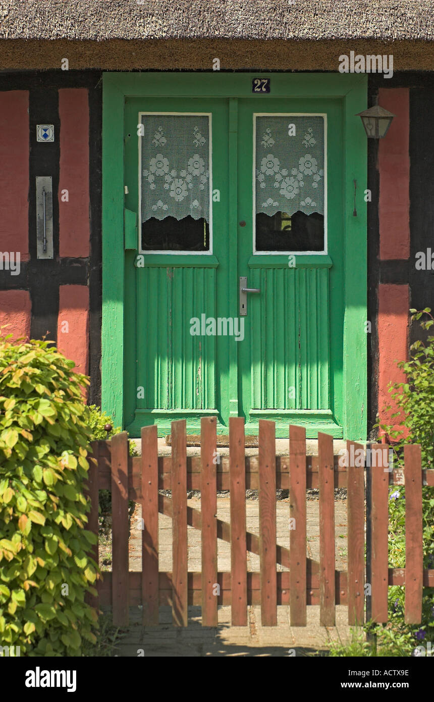 Colored entrance door at a typical house at Wustrow Fischland Germany ...