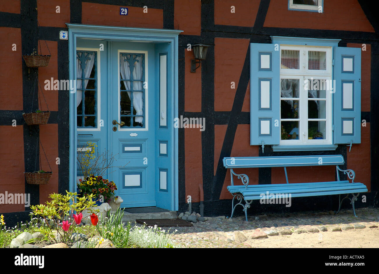 Colored entrance door at a typical house at Wustrow Fischland Germany ...