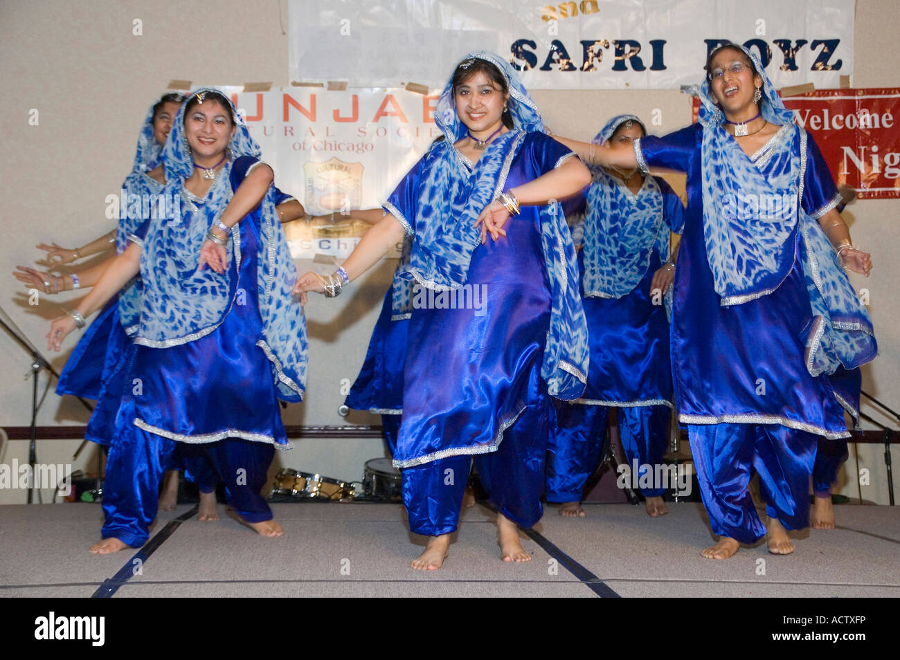 GIRLS IN BLUE UNIFORMS PERFORMING GIDHA DANCE Stock Photo - Alamy