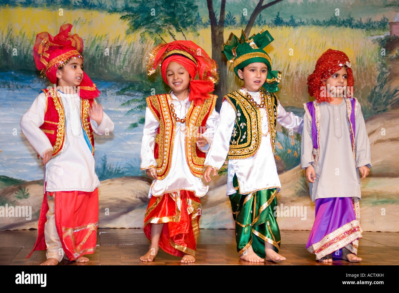 Group of small boys doing bolian in bhangra Stock Photo - Alamy