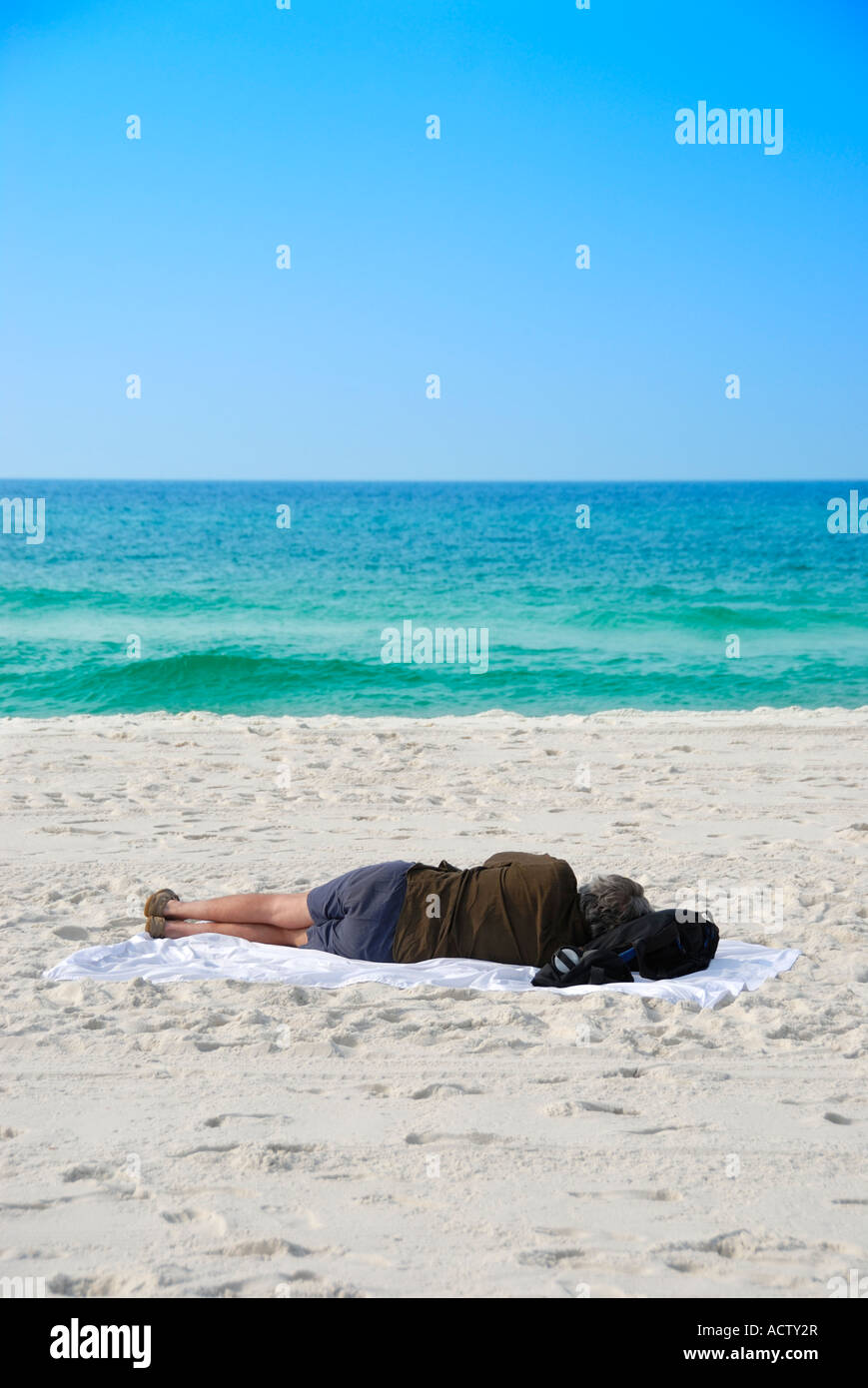 Asleep on the beach Stock Photo - Alamy
