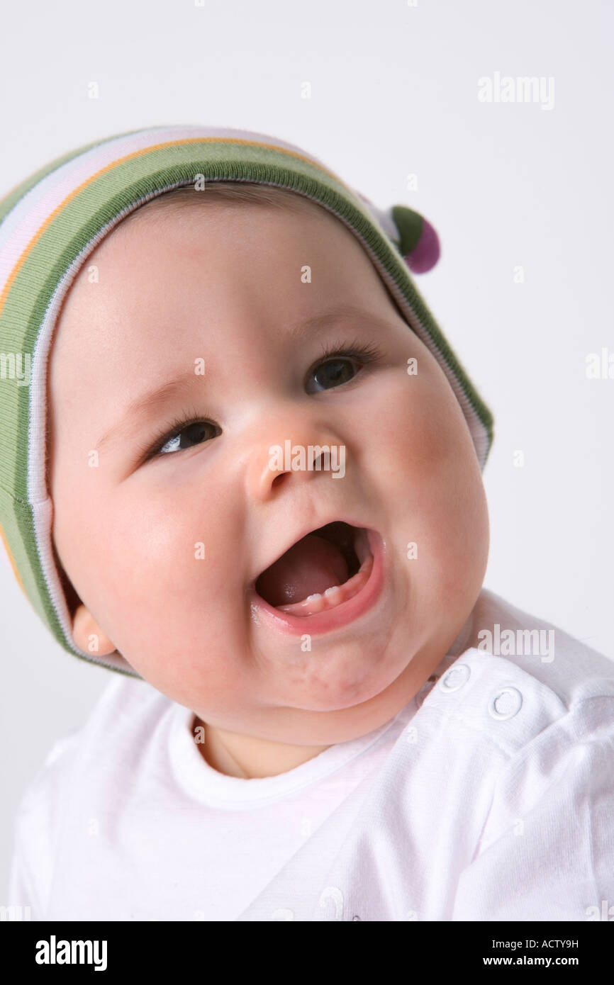 Happy baby portrait with a hat Stock Photo - Alamy