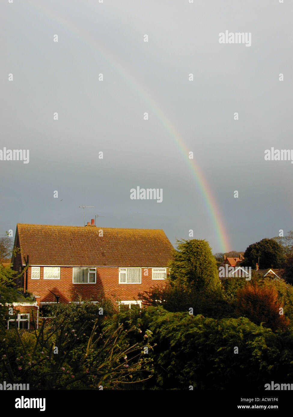 Rainbow after a thunder storm Stock Photo - Alamy