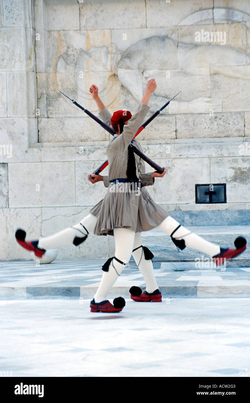 Two guards in full goose step stride at the changeing of the guard ...