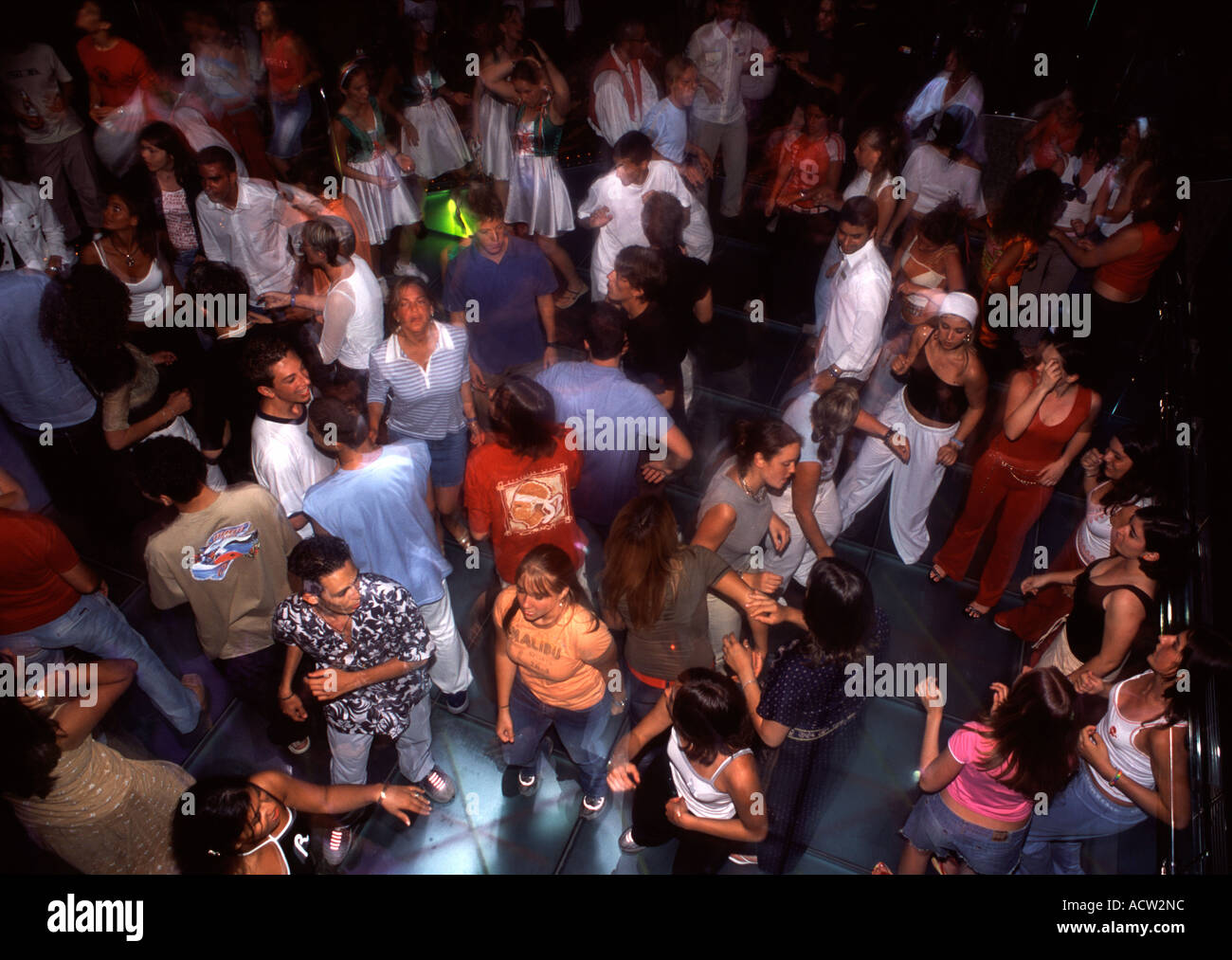Clubbers dancing in a discotheque Stock Photo - Alamy