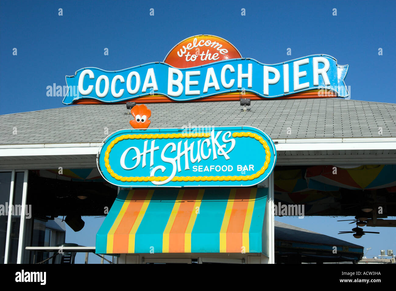 The Cocoa Beach Florida Pier and Seafood Bar sign Stock Photo - Alamy