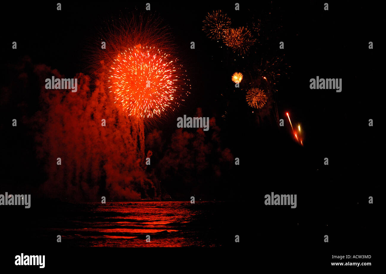 Firework showcase over sea water Stock Photo - Alamy