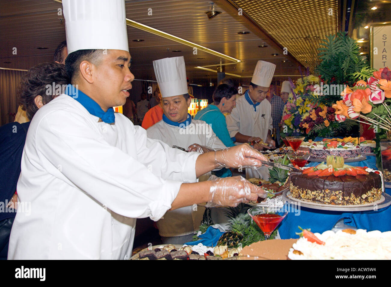 Chefs serving desserts at the Desert Extravaganza on the cruise ship ...