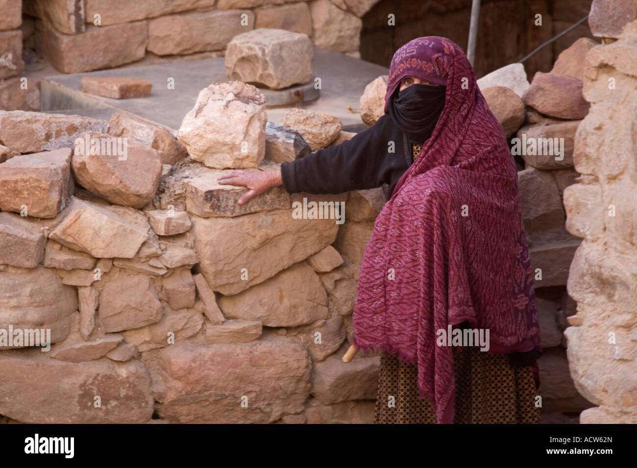 Yemeni women in the village of Thulla wearing the traditional colourful ...